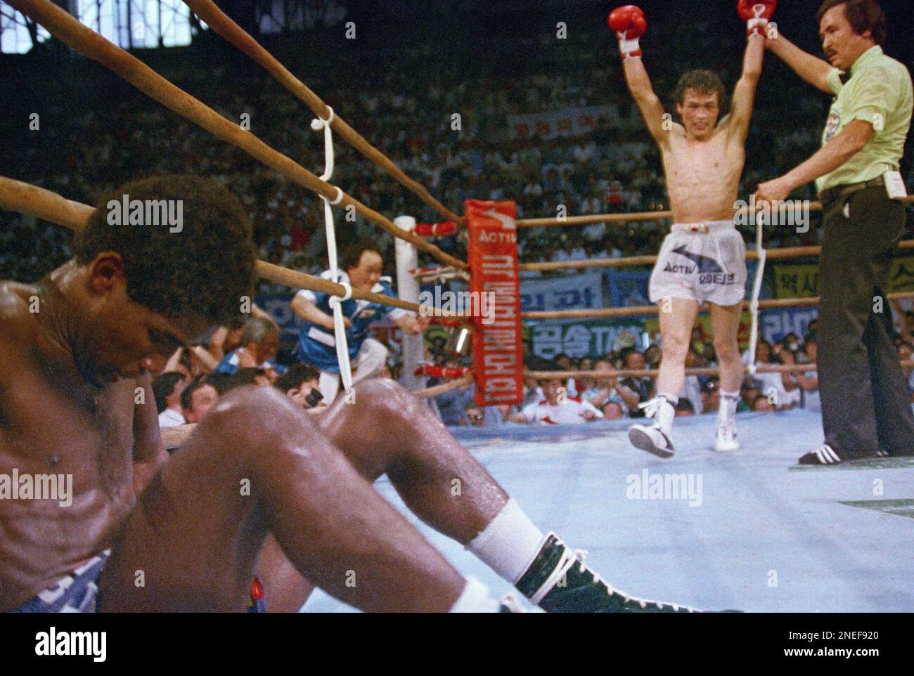 American referee Carlos Padila declares South Korean champion Jung- Koo ...