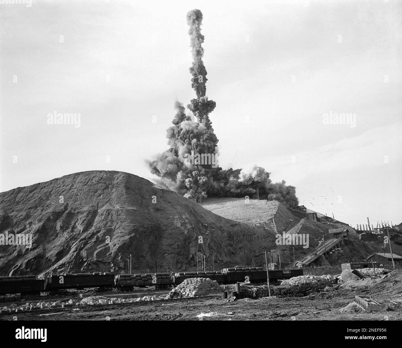 Only a column of smoke remains to mark shape of one of the many ...