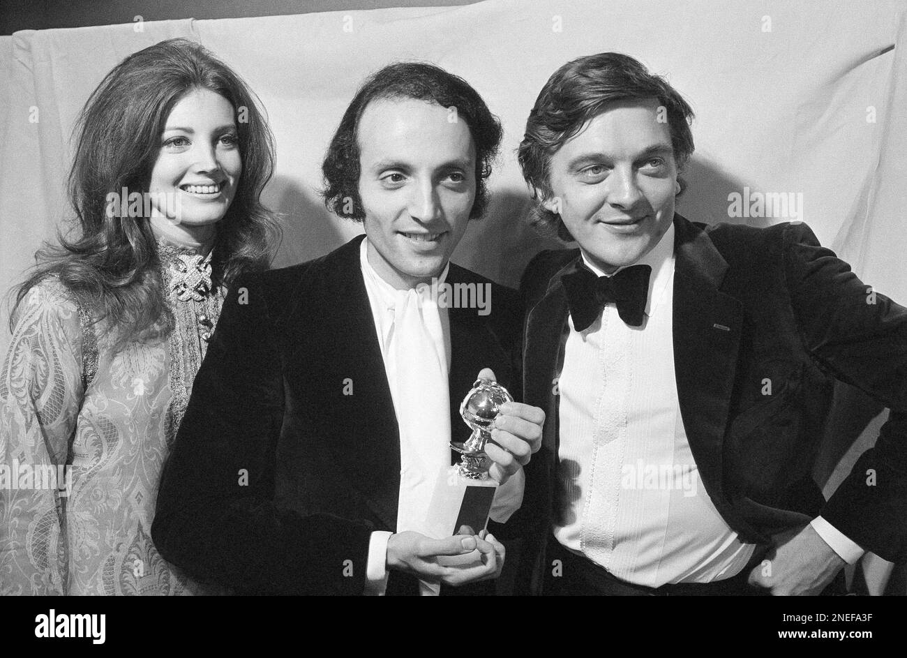 Erich Segal, center, with presenters David Hemmings and his wife Gail ...