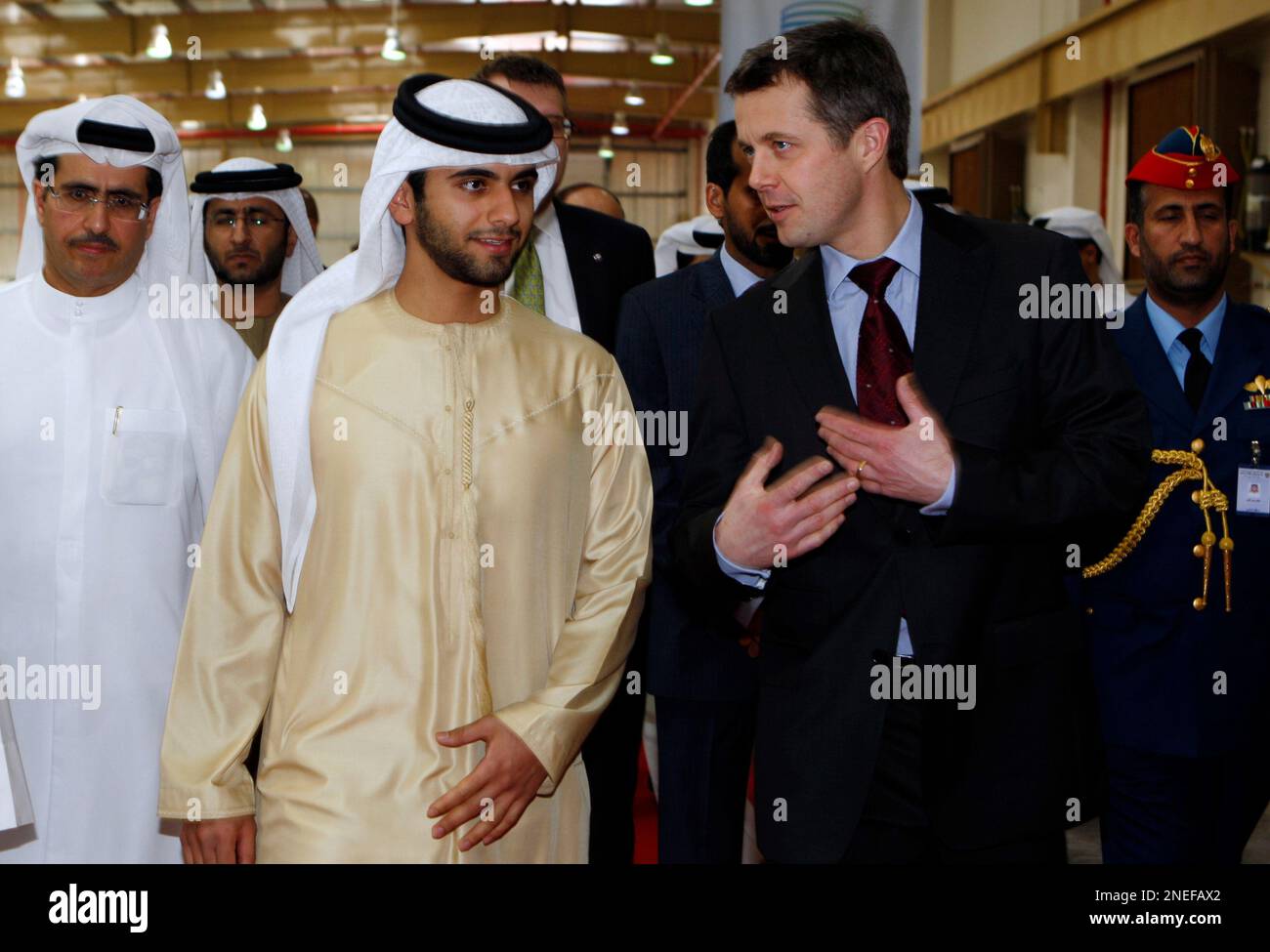 Danish Crown Prince Frederik, 2nd right, talks to Sheilk Mansour Bin ...