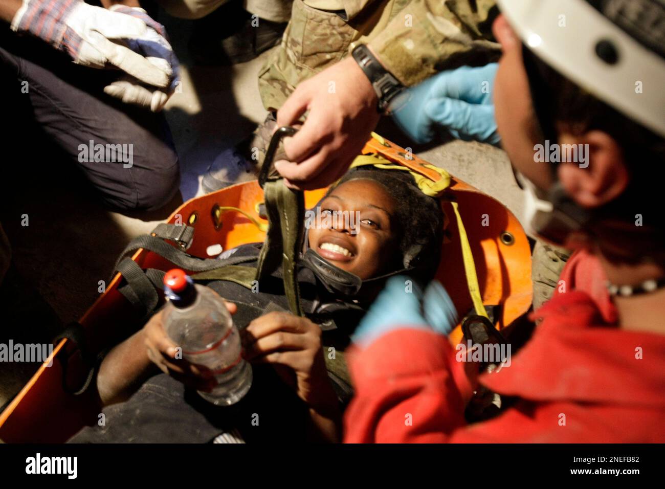 Earthquake survivor Hotteline Lozama, 26, smiles as she was pulled out ...