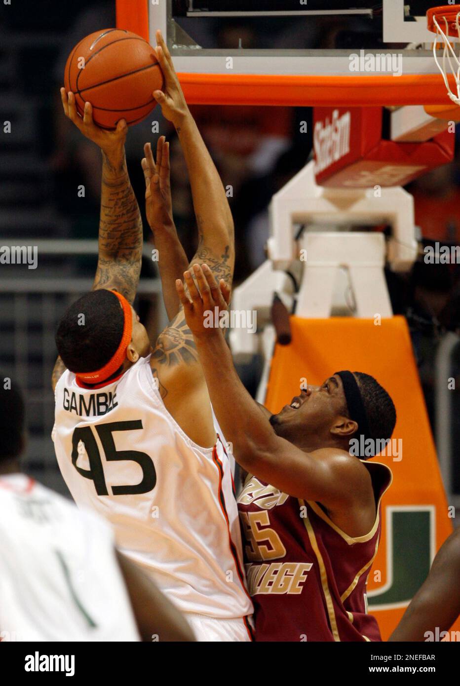 Boston College's Cortney Dunn, right, defends against Miami's Julian ...