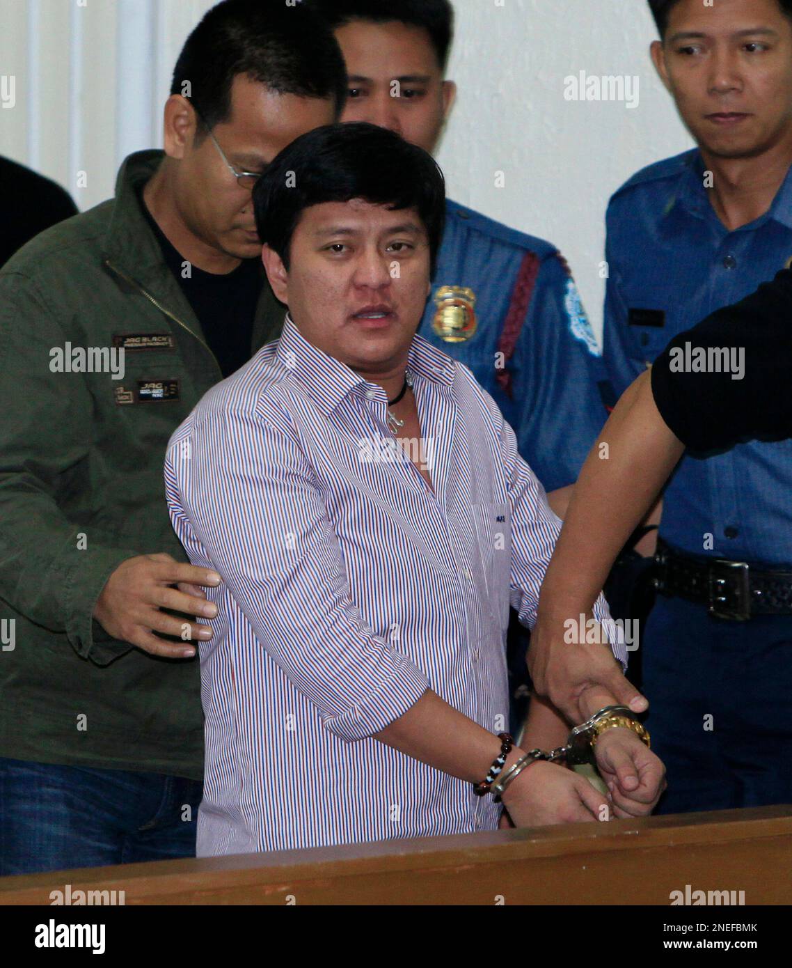 Andal Ampatuan Jr., center, the prime suspect in the massacre of 57 ...