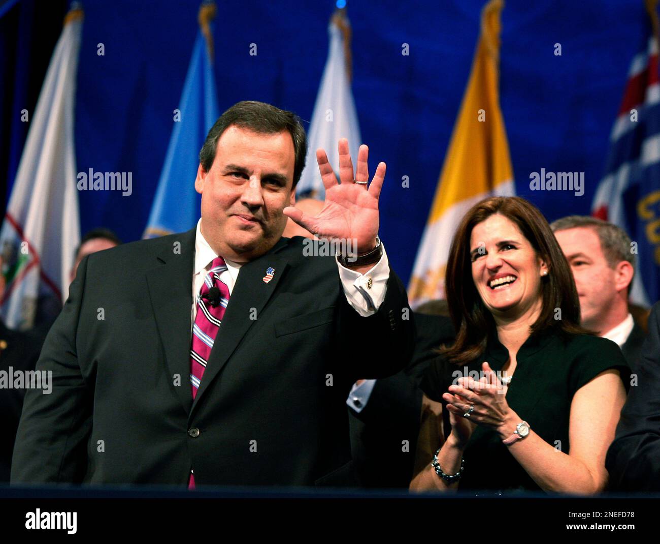 New Jersey Gov. Chris Christie waves as his wife Mary Pat Christie ...