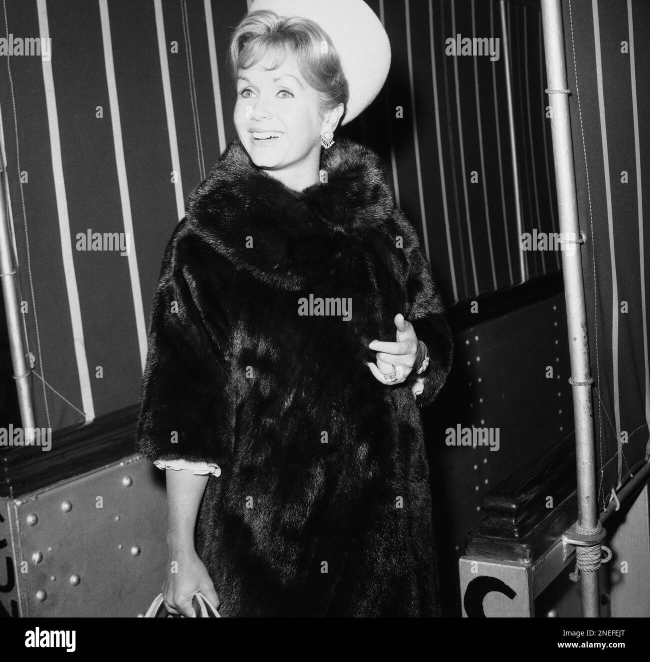 Actress Debbie Reynolds is shown prior to boarding the liner Queen ...