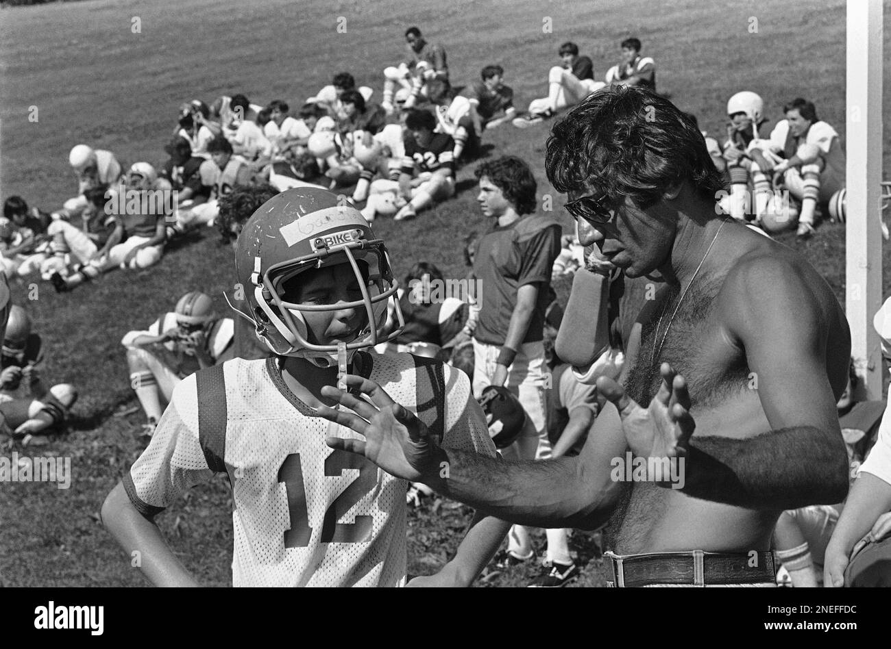 Joe Namath behind the dark lenses at right, giving some quarterbacking ...