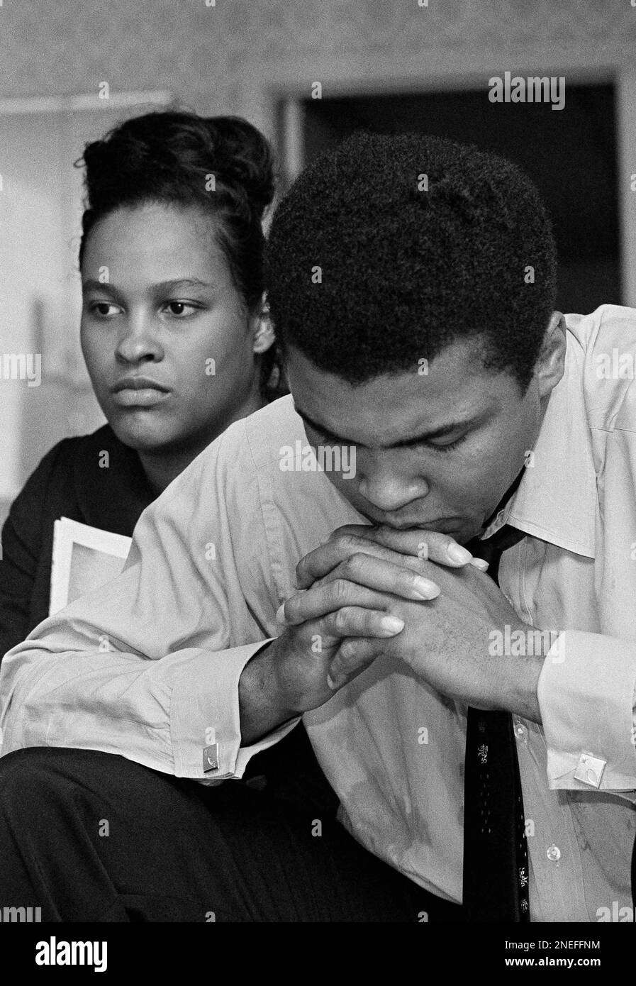 Muhammad Ali reflects a mood of rugged determination as he sits, at his ...