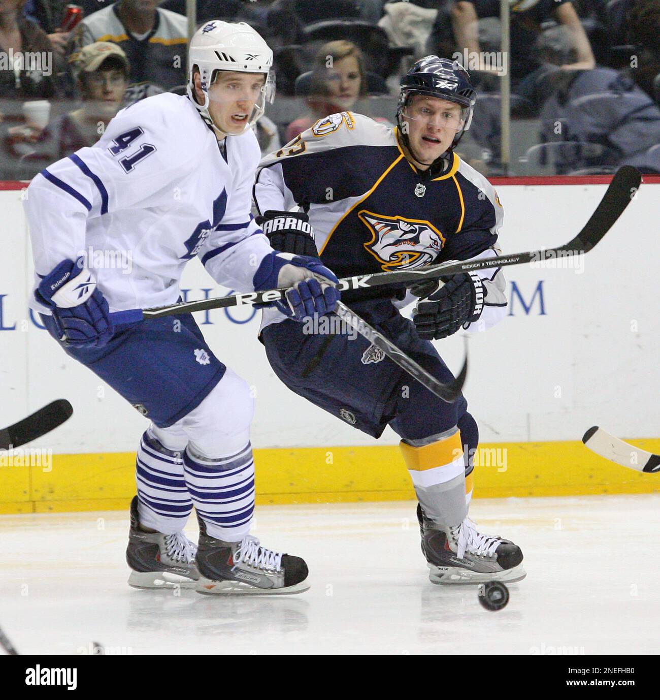 Nashville Predators center Nick Spaling, right, and Toronto Maple Leafs ...