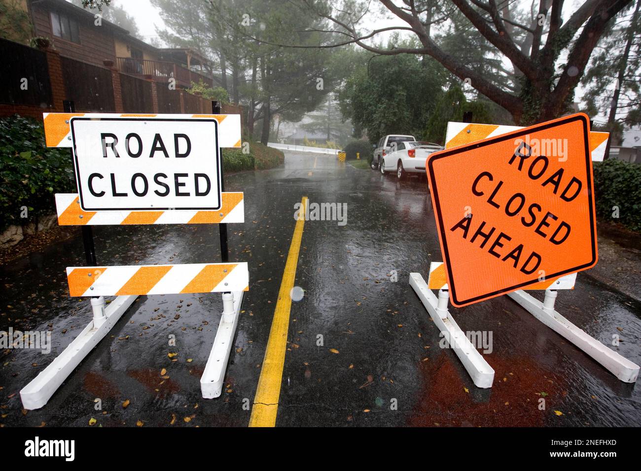 Road signs are placed at the La Canada Flintridge neighborhood near a ...