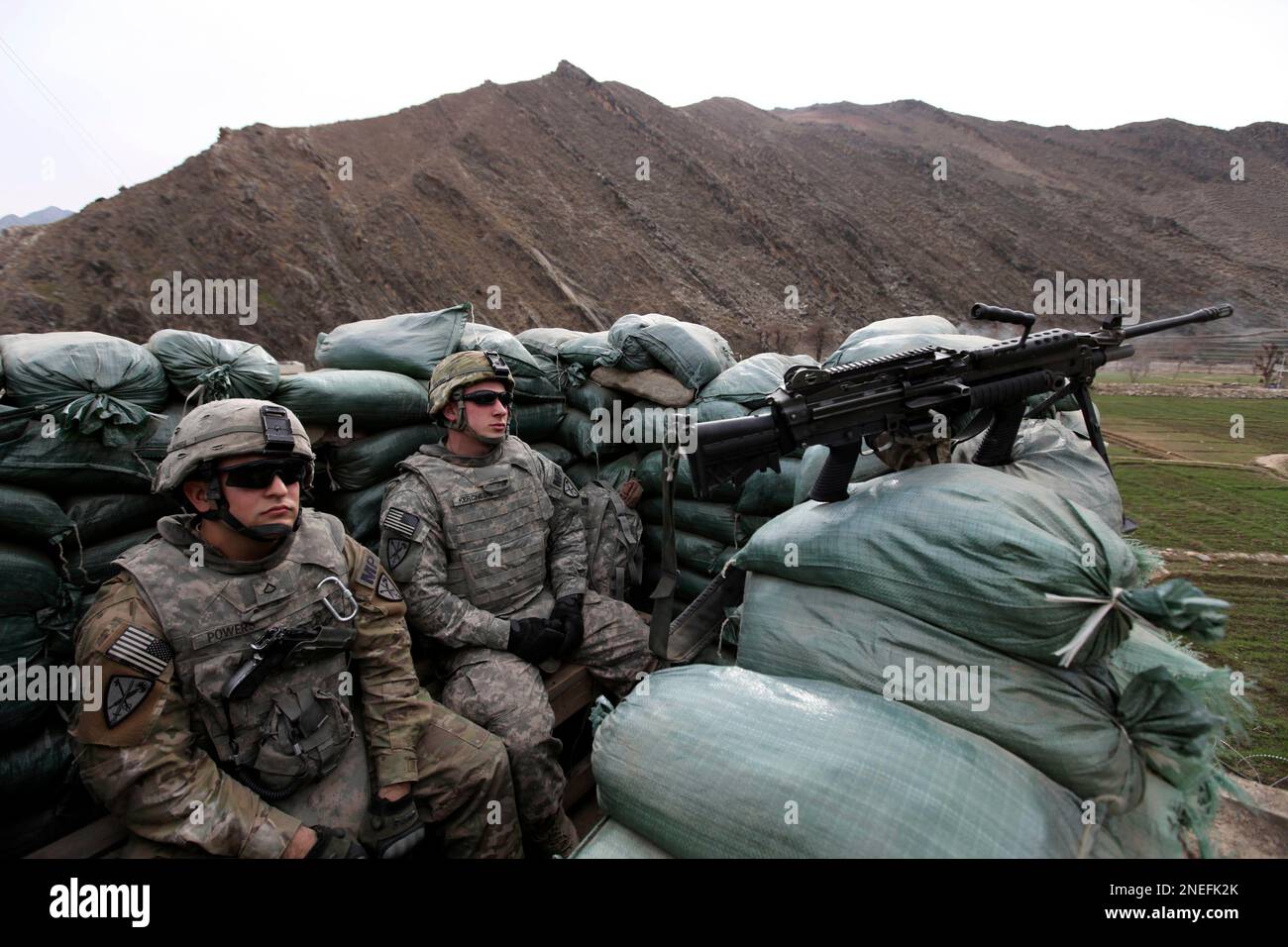U.S. Army Military Police Pfc. Anthony Powers, left, of Kanosha, Wis ...
