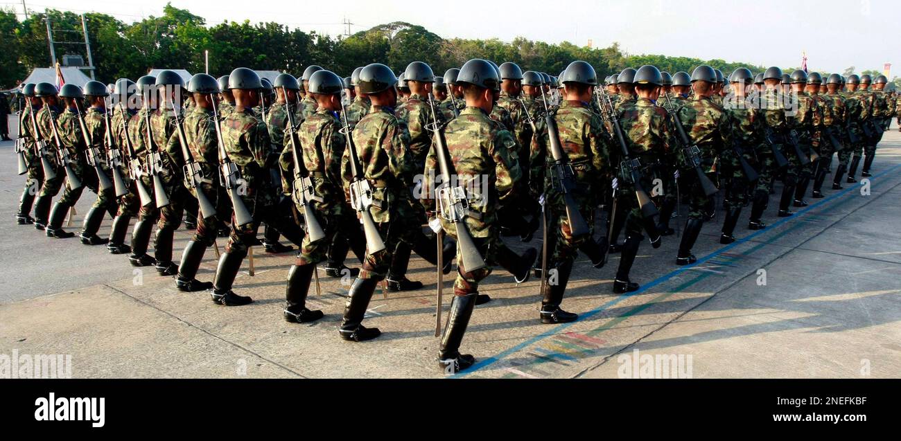 Thai soldiers march during a ceremony marking Thailand's Armed Forces ...