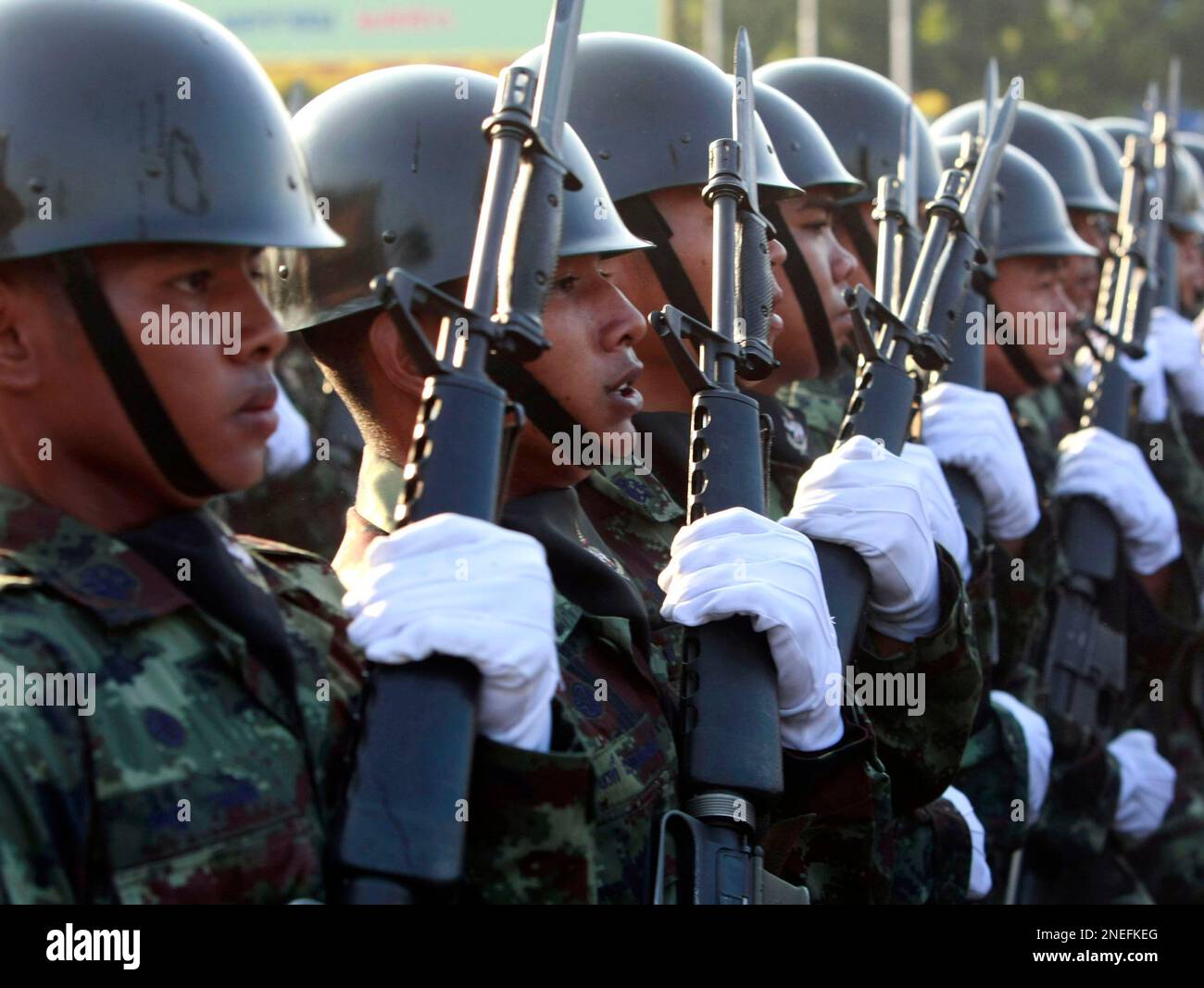 Thai soldiers march during a ceremony marking Thailand's Armed Forces ...