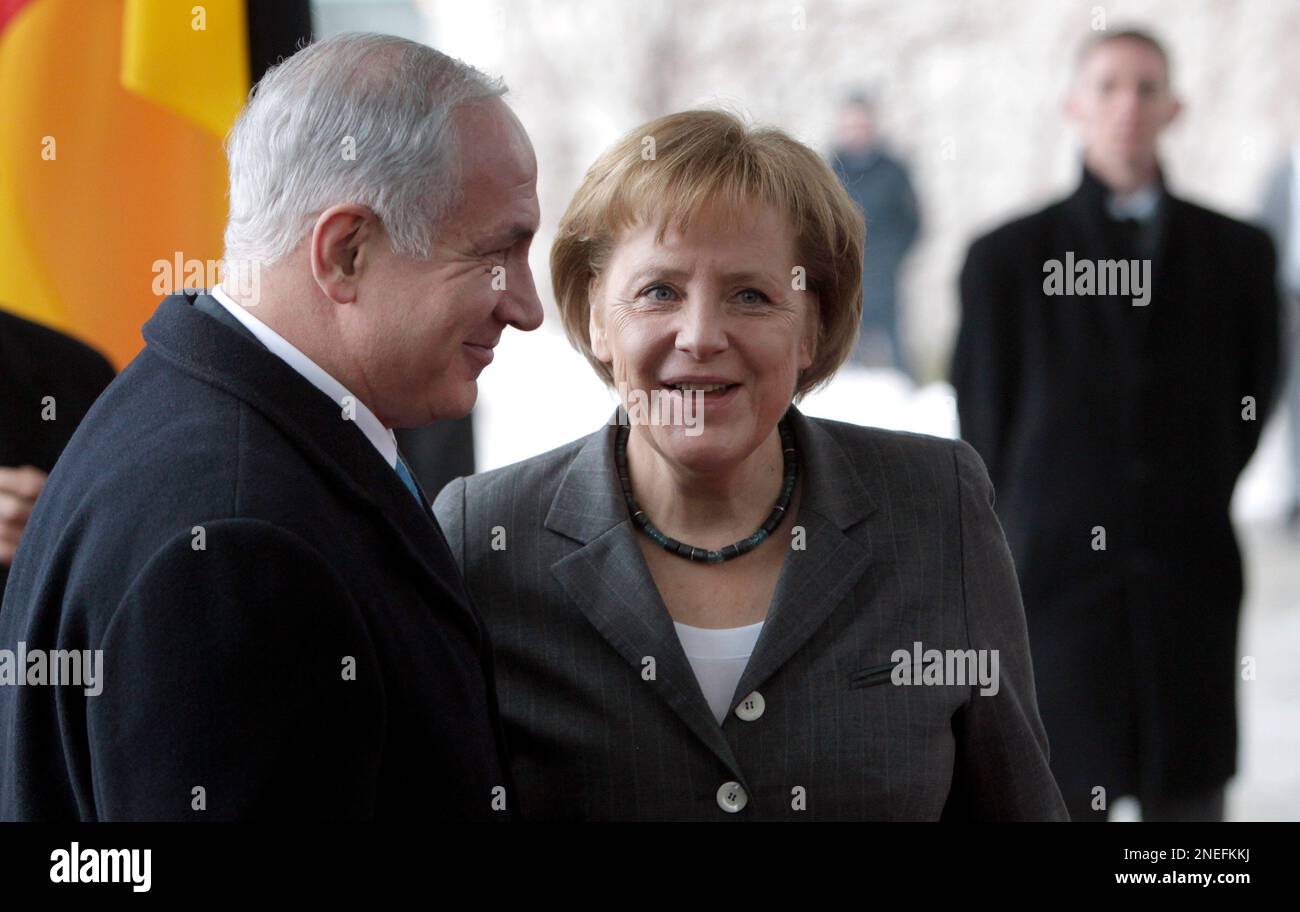 German Chancellor Angela Merkel, right, welcomes Israeli Prime Minister ...