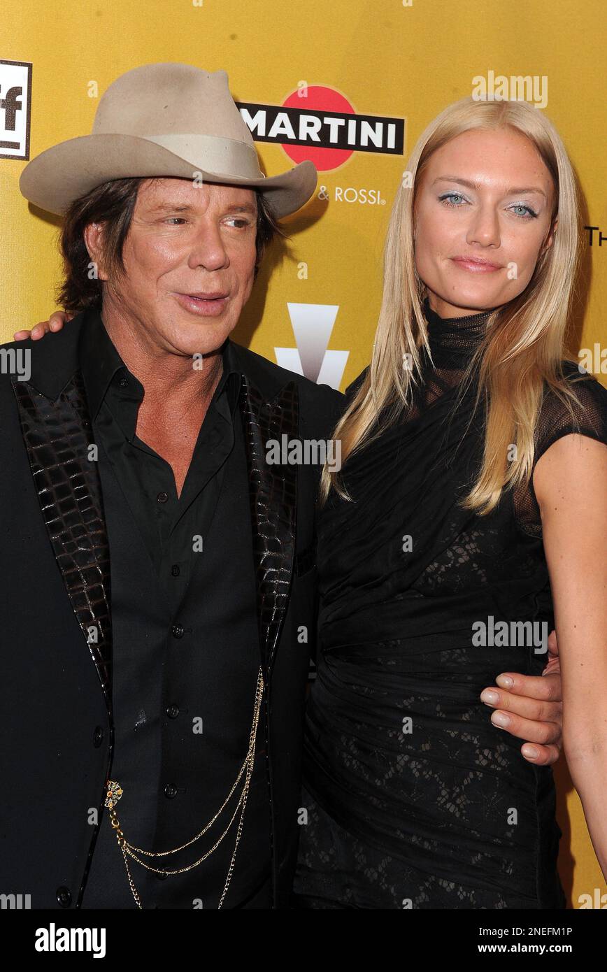 Mickey Rourke, at left, and Elena Kuletskaya arrive at The Weinstein ...