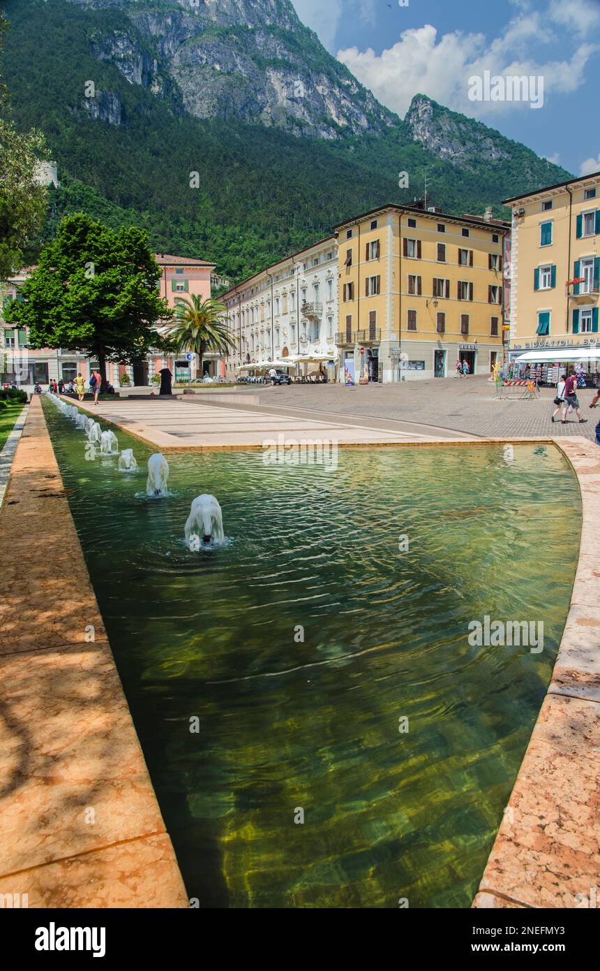 Water feature in the lakeside town of Riva Del Garda, Lake Garda, Italy ...