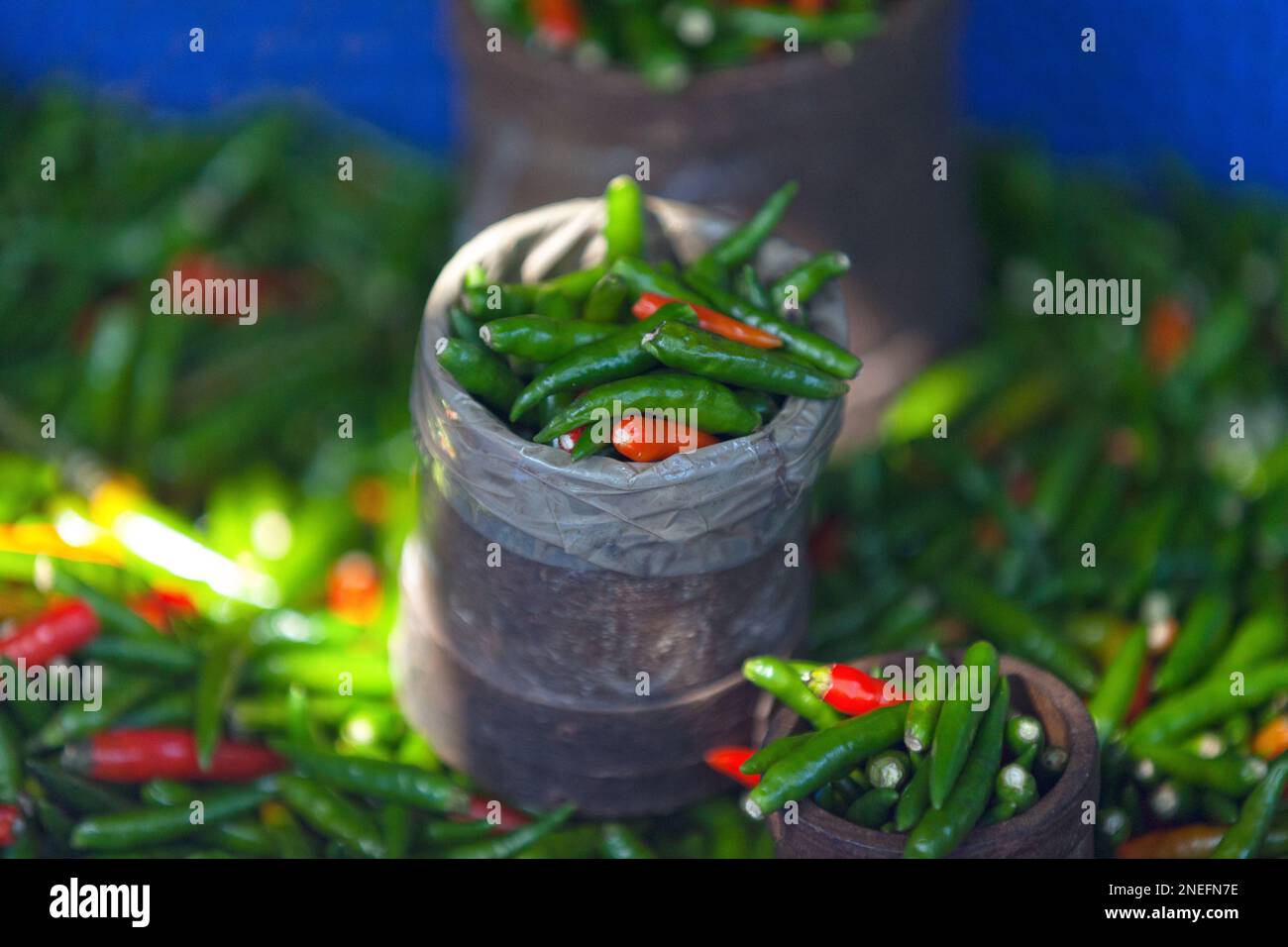 Full frame close-up on a stack of piment oiseau (Capsicum frutescens ...