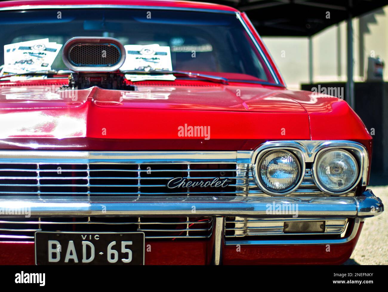Muscle on Wheels: The Sleek and Powerful Red Chevrolet Impala Stock ...