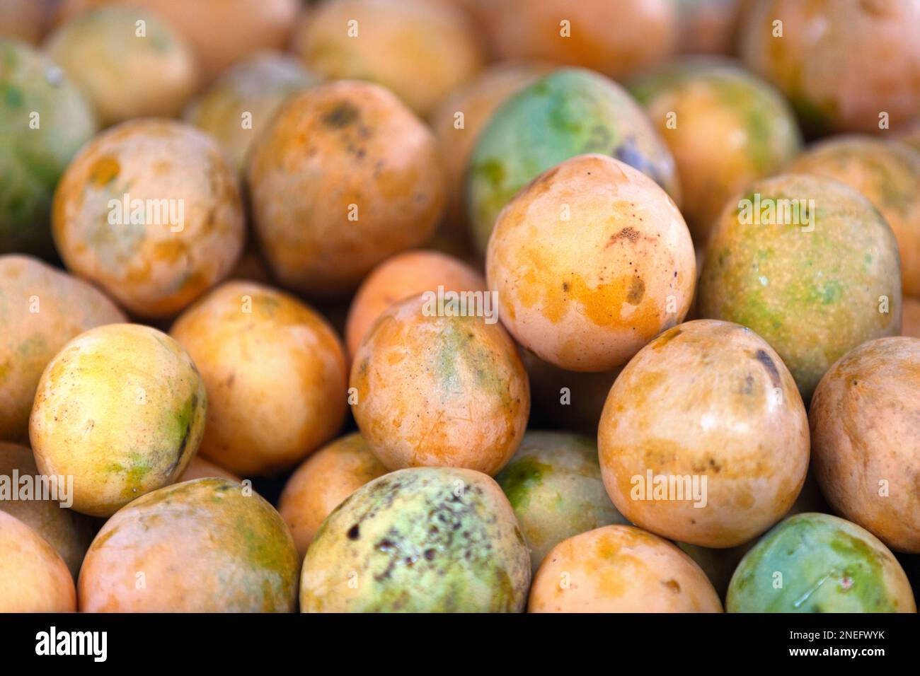 Close-up on a stack of mangoes for sale on a market stall Stock Photo ...
