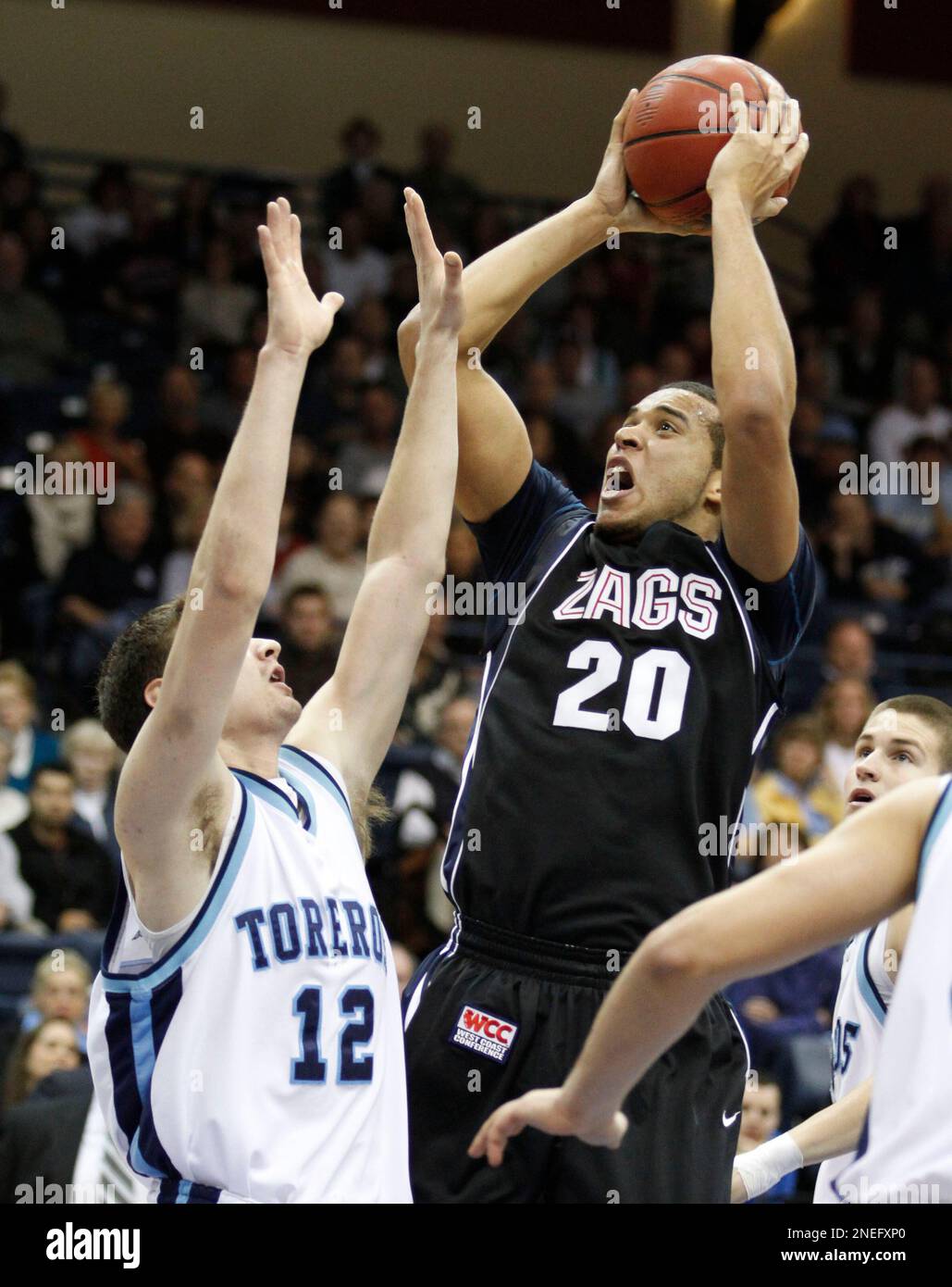 Gonzaga's Elias Harris (20) shoots over the block of San Diego's Chris ...