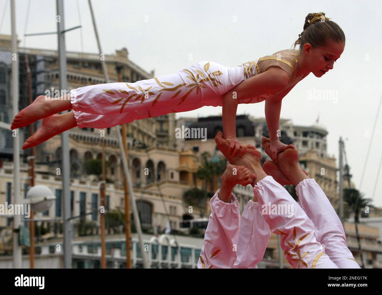 French acrobats "Acrotrio" parade at the harbour of Monaco, alongside ...