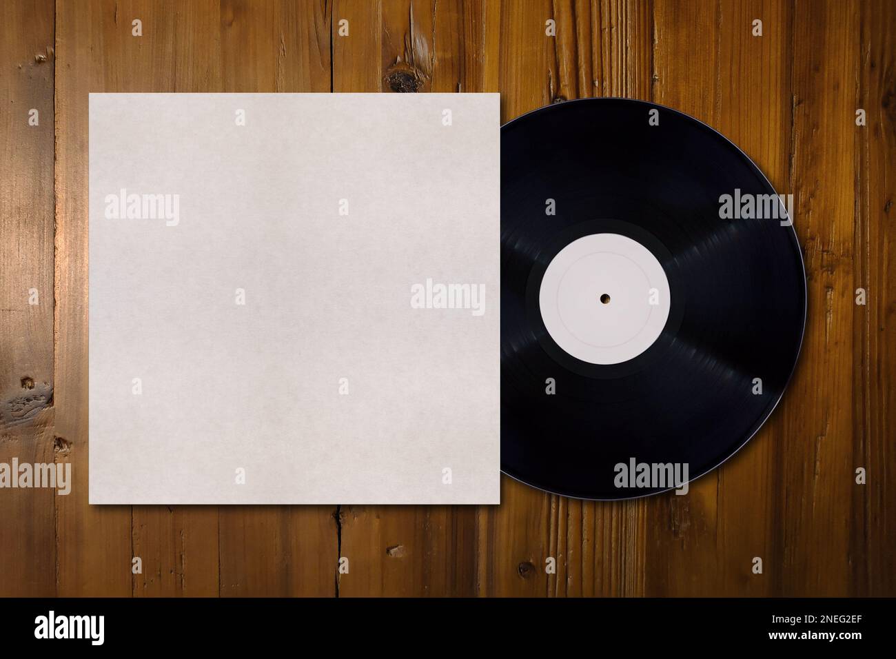 Close-up on wood board with on its middle a vinyl record mockup with ...