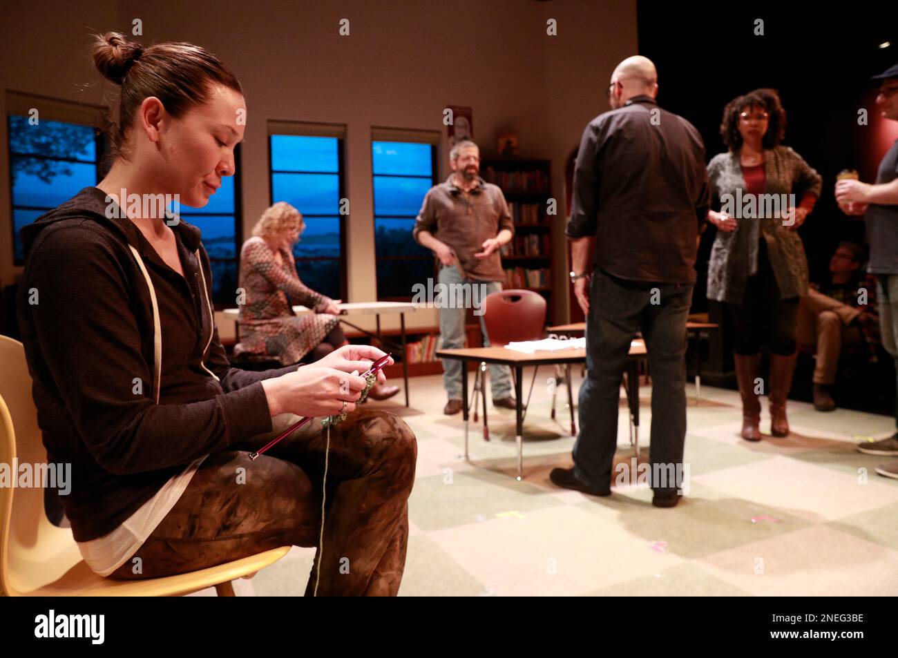 Cast members gathered, including Charisse Loriaux, (left), on the set ...