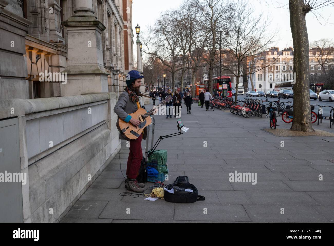 Man busking along Cromwell Road, Royal Borough of Kensington and ...