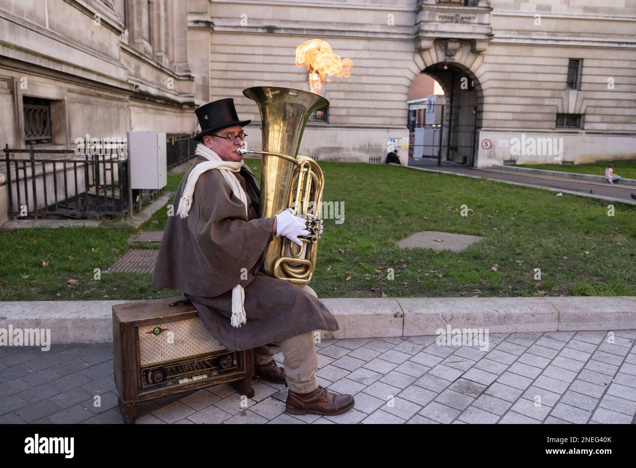Man busking with his flaming Tuba, along Exhibition Road, Royal Borough ...