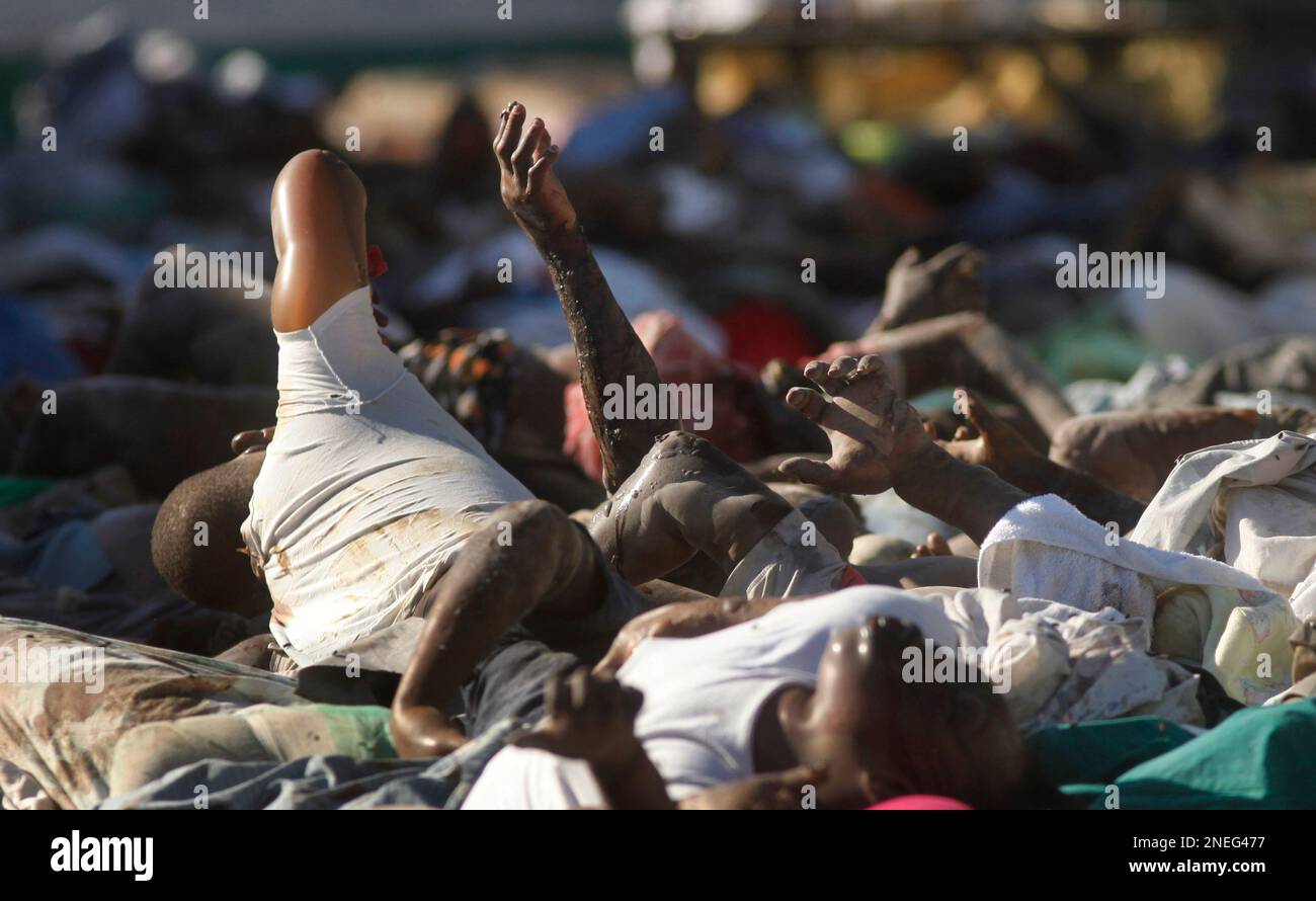 Piles of bodies are seen outside the morgue in the aftermath of the ...
