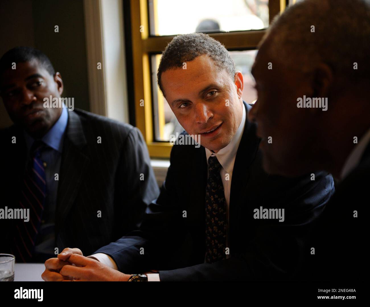 Democrat Harold Ford Jr., center, lunches at Sylvia's with friend Ron ...