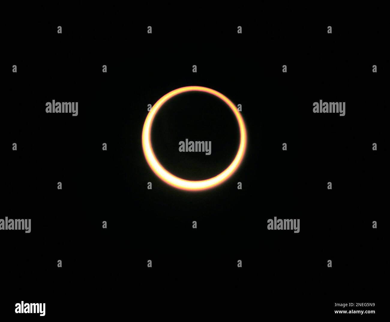 An annular solar eclipse is seen formed over the sky of Myanmar's ...