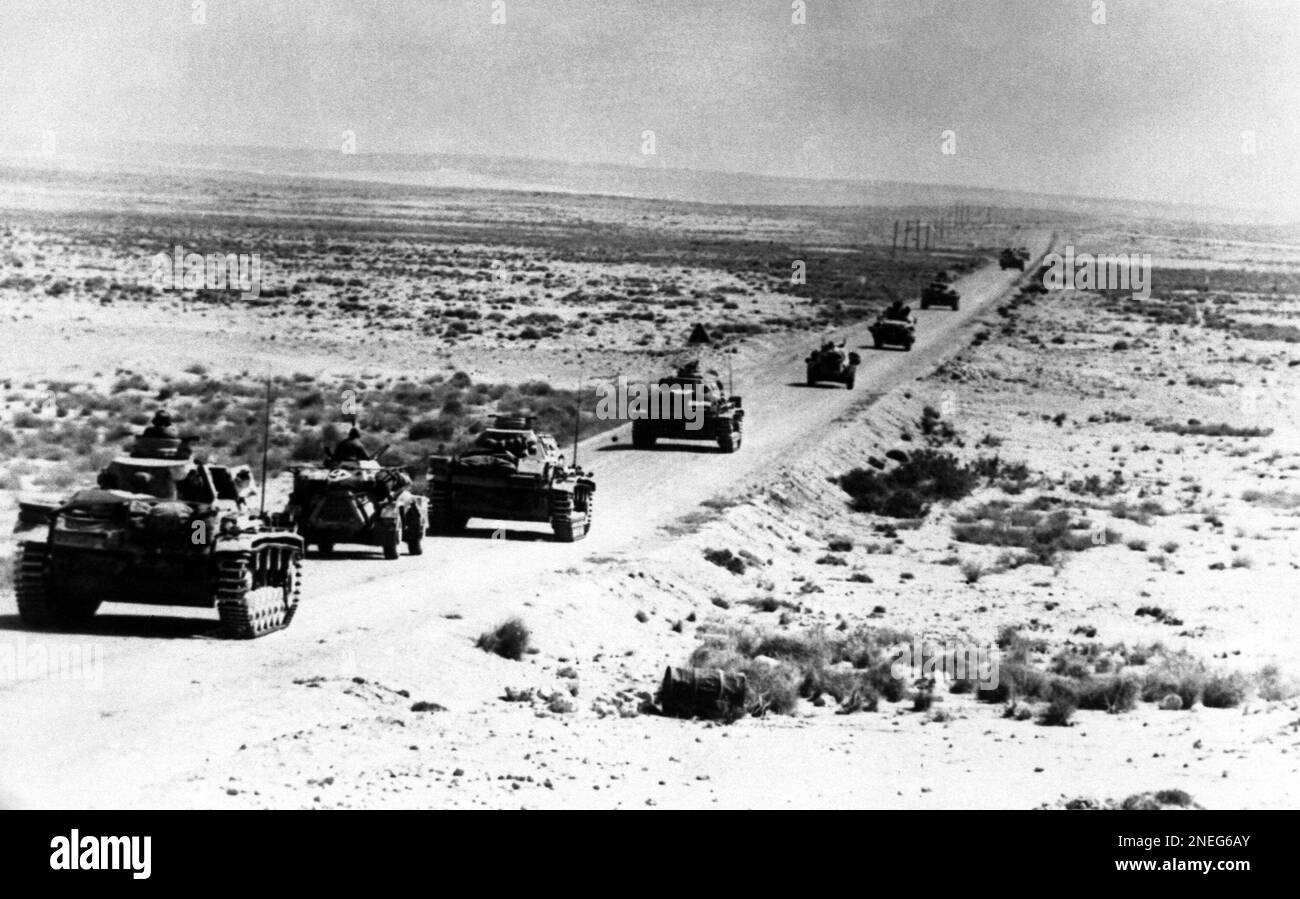 German tanks are seen rumbling across the Libyan Desert in Libya on May ...