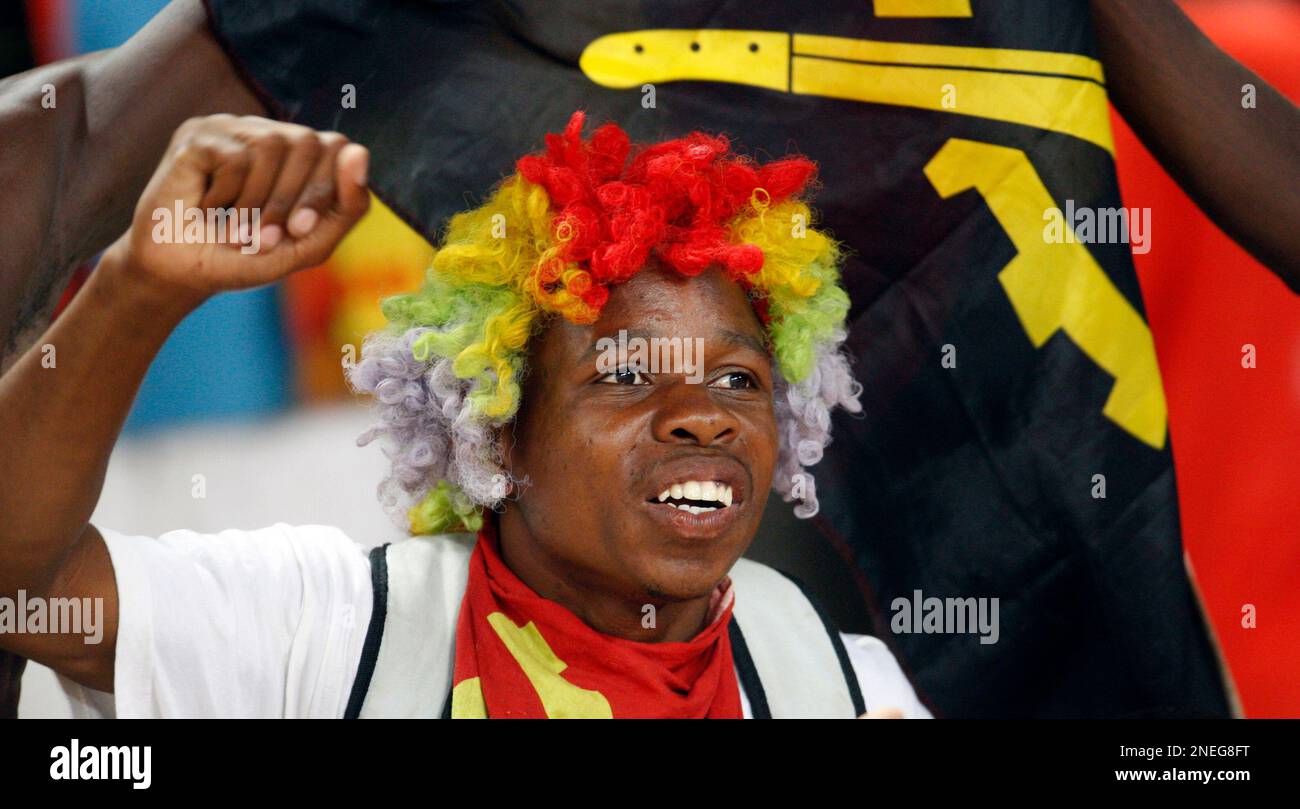 An Angolan fan supports his team during their African Cup of Nations ...