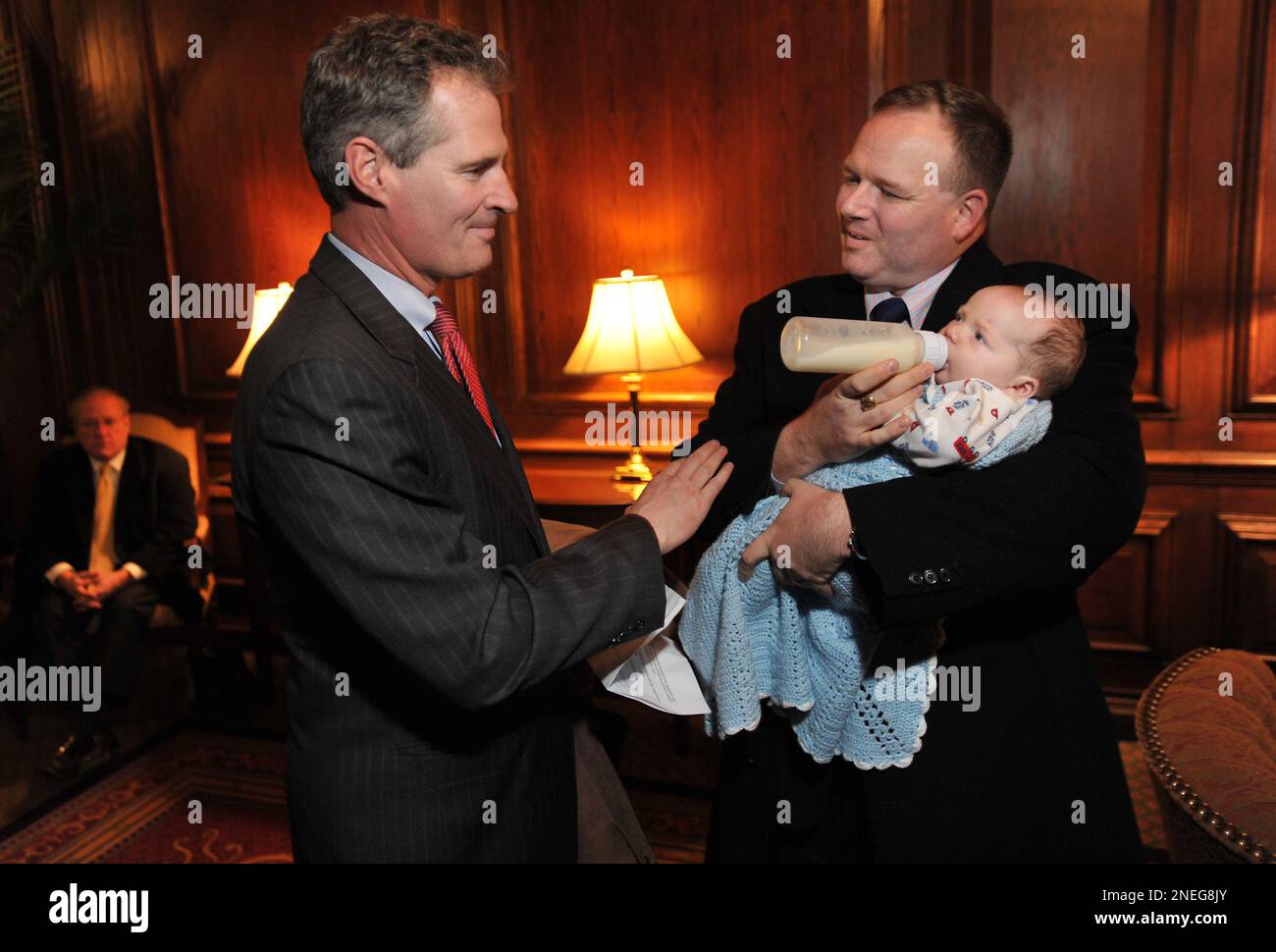 Republican Senate candidate Scott Brown, left, greets supporter Chad ...