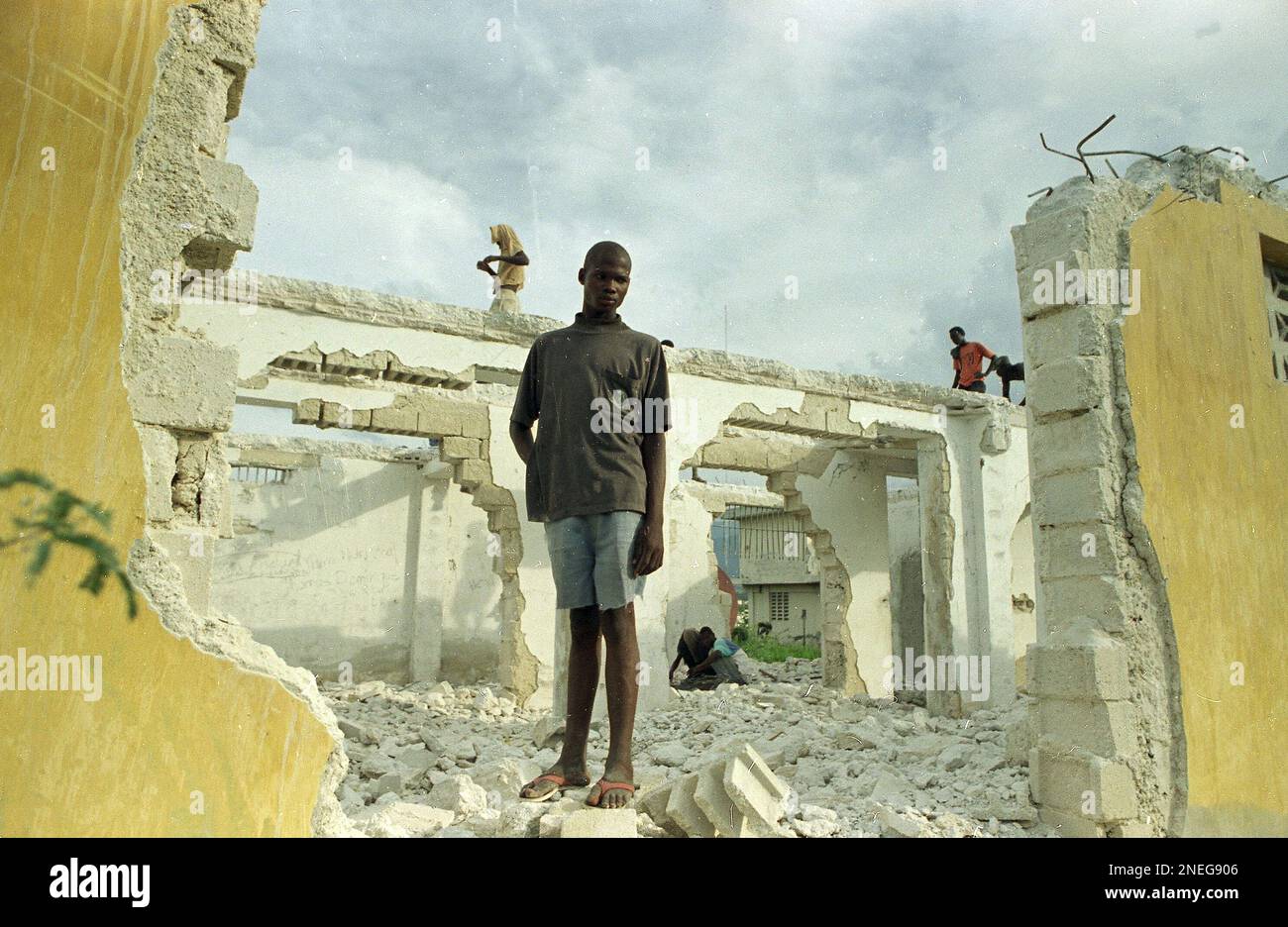 A Haitian squatter stands amid the rubble of Fort Dimanche in Port-au ...