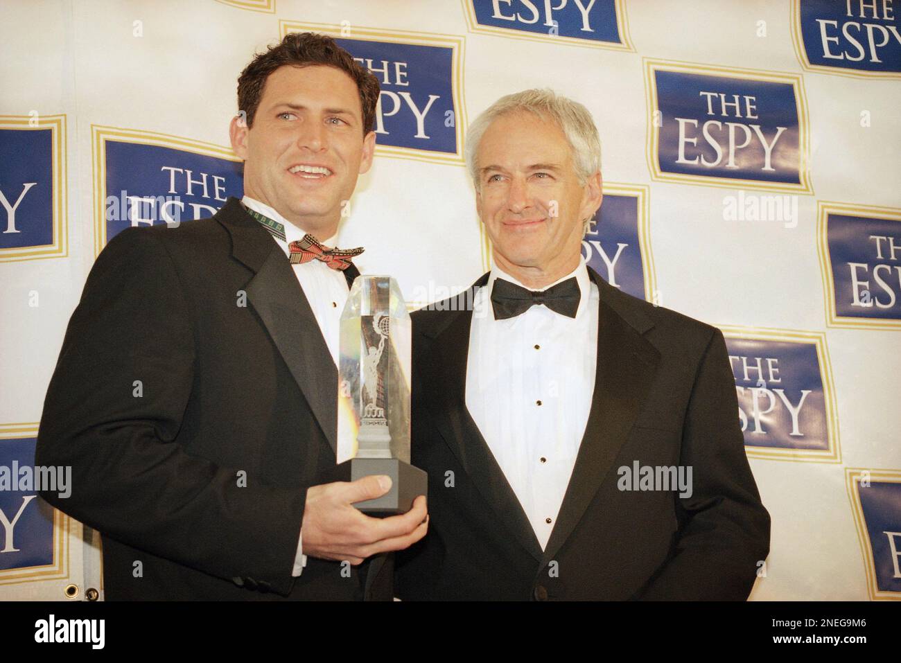 San Francisco 49ers quarterback Steve Young, left, and coach George ...