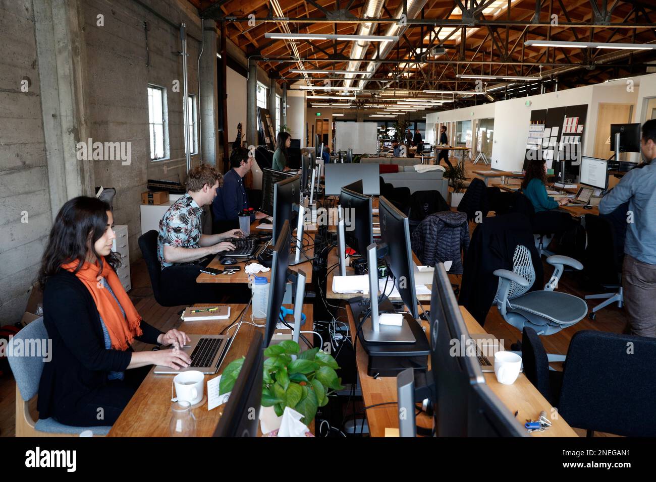 Sarah Bindman, (left) at her work station at the headquarters of Remix ...