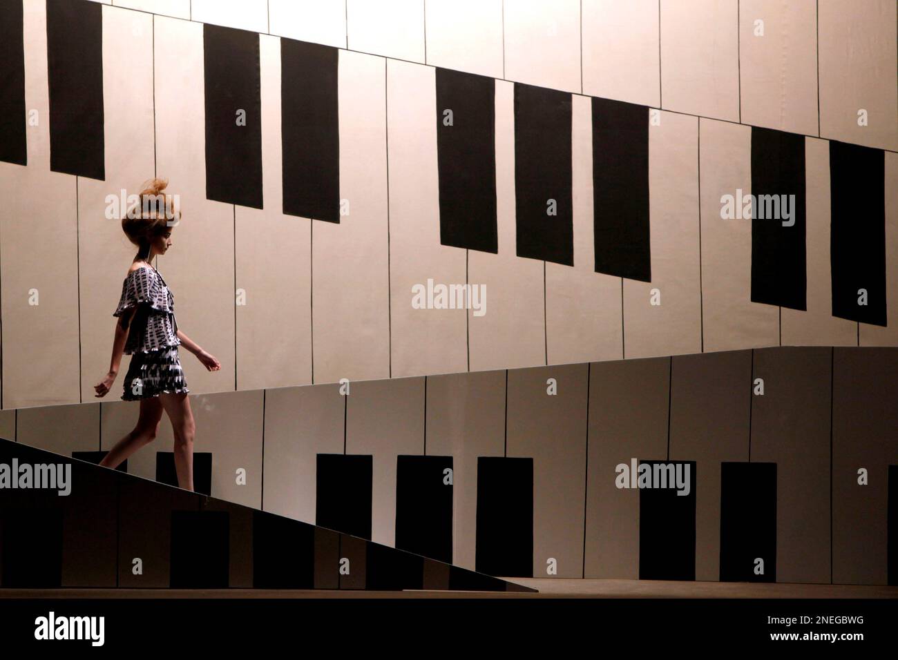 A model wears a design from the Alessa collection at the Fashion Rio ...