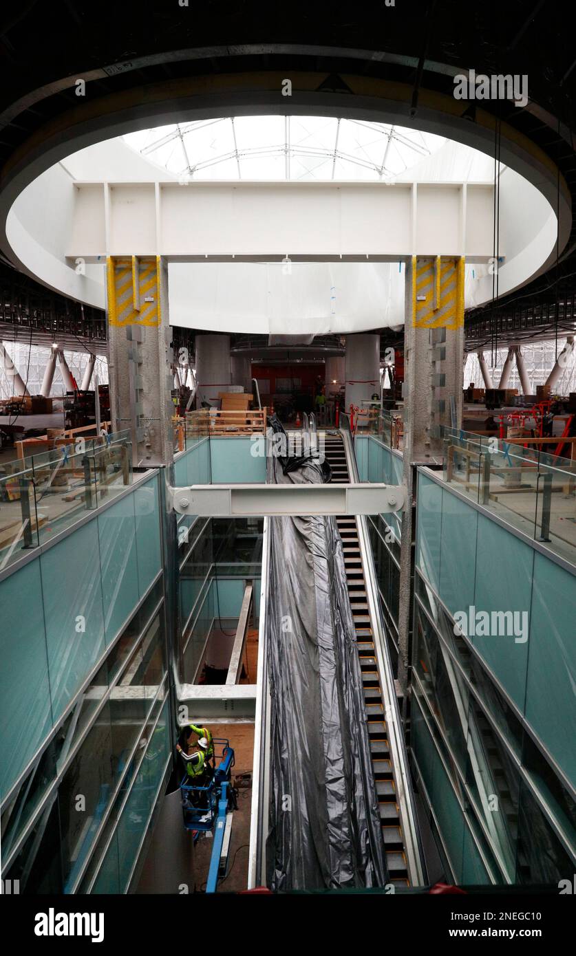 Escalators lead up to the bus deck as construction continues on the ...