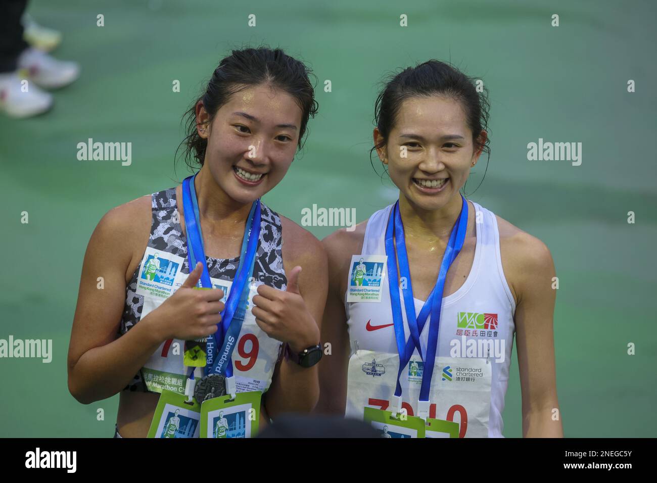 (L-R) WomenHH Half Marathon champion Virginia Lo Ying-chiu and 1st runner-up Crystal Vut Tsz ...