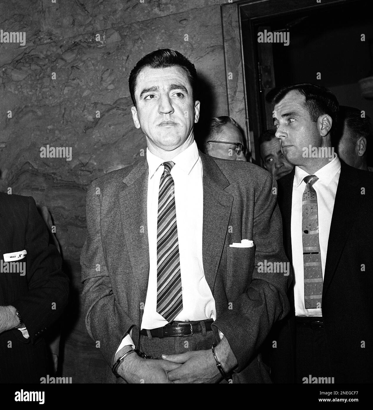 Convict-author Caryl Chessman, wearing handcuffs, is shown in San ...