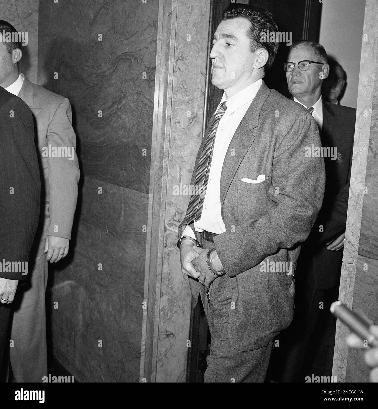 Convict-author Caryl Chessman, wearing handcuffs, is shown in San ...