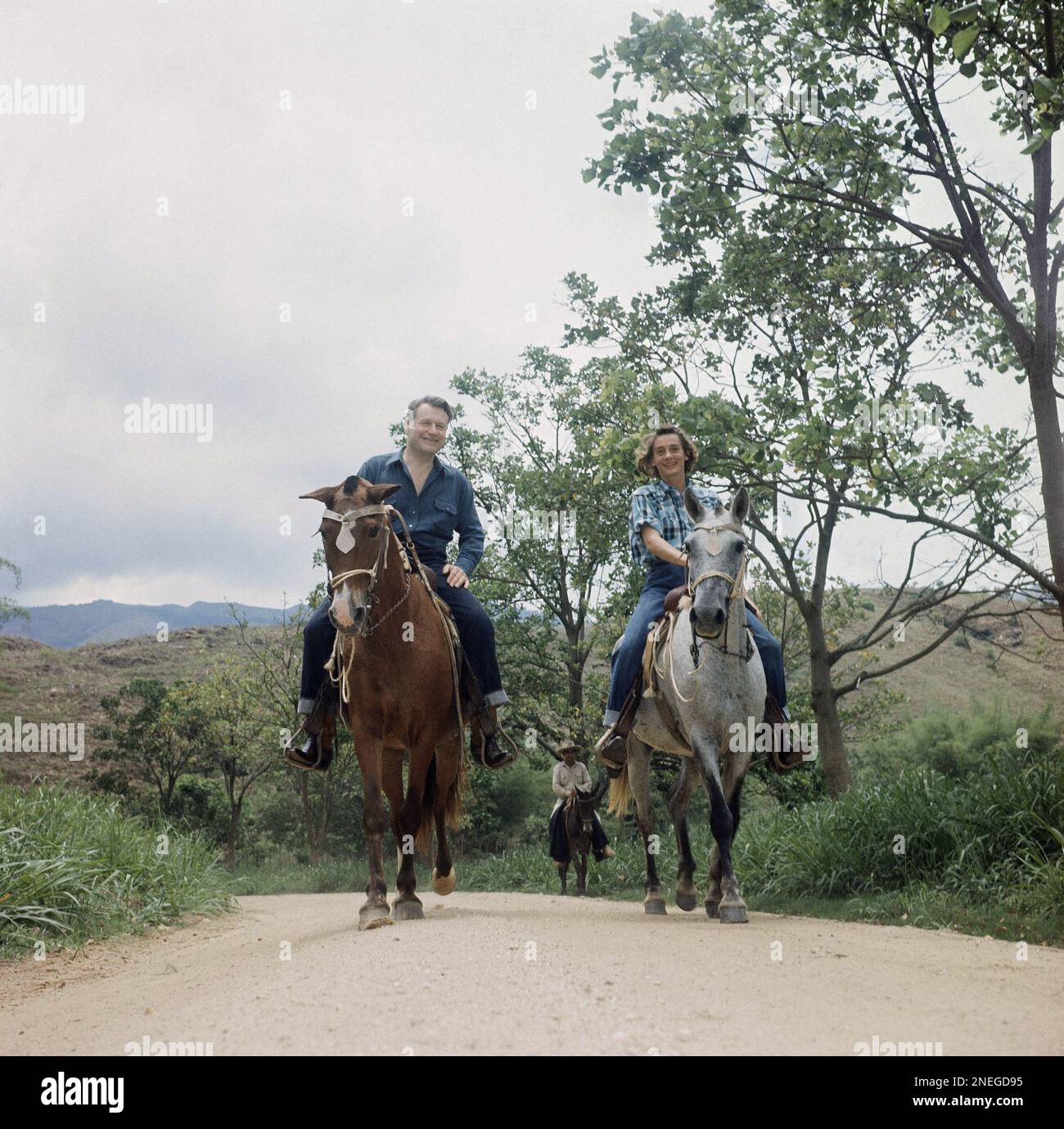 Nelson Rockefeller and wife ?Happy? horseback riding on farmMonte Sacro ...