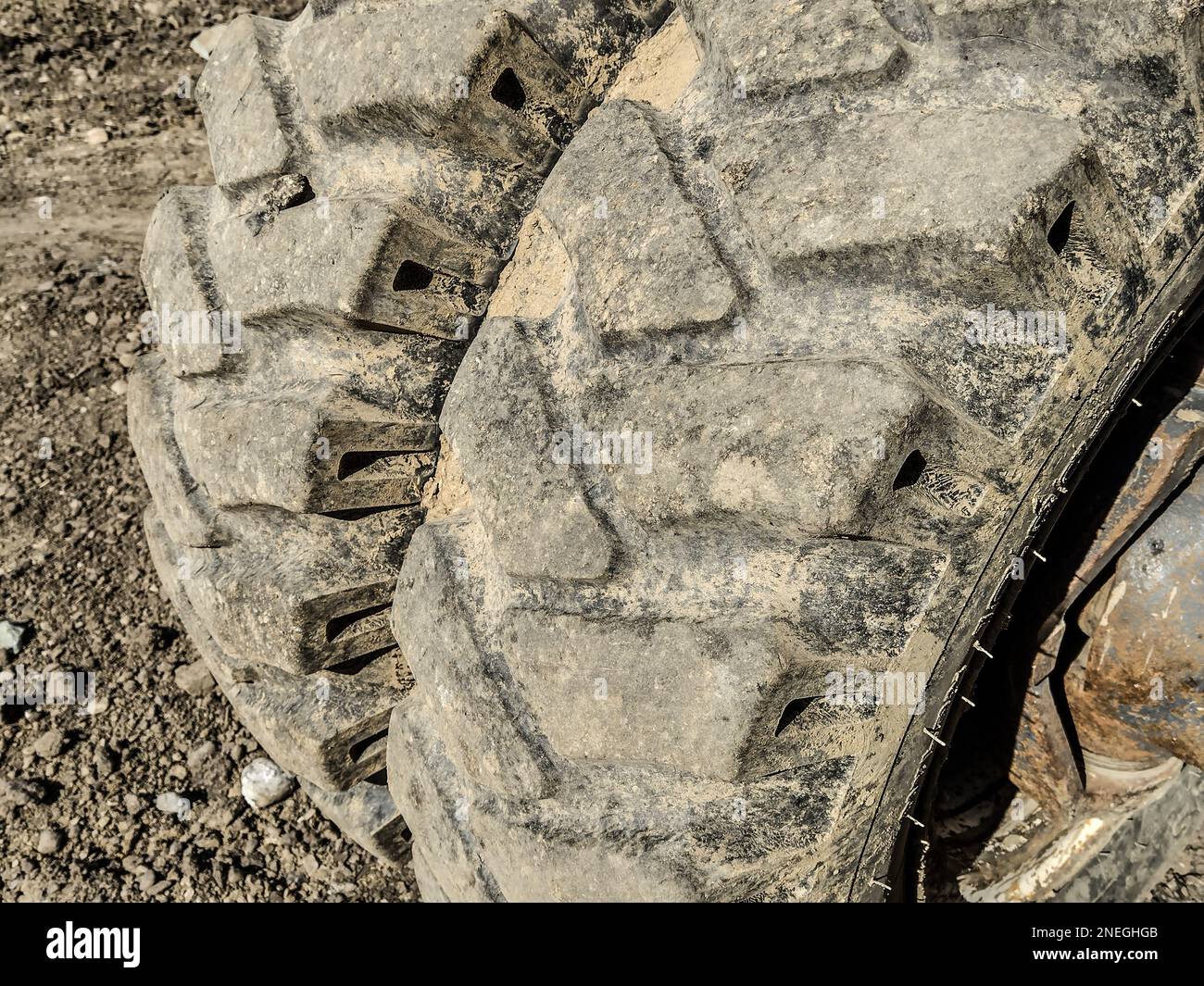 the wheels of an excavator Stock Photo - Alamy