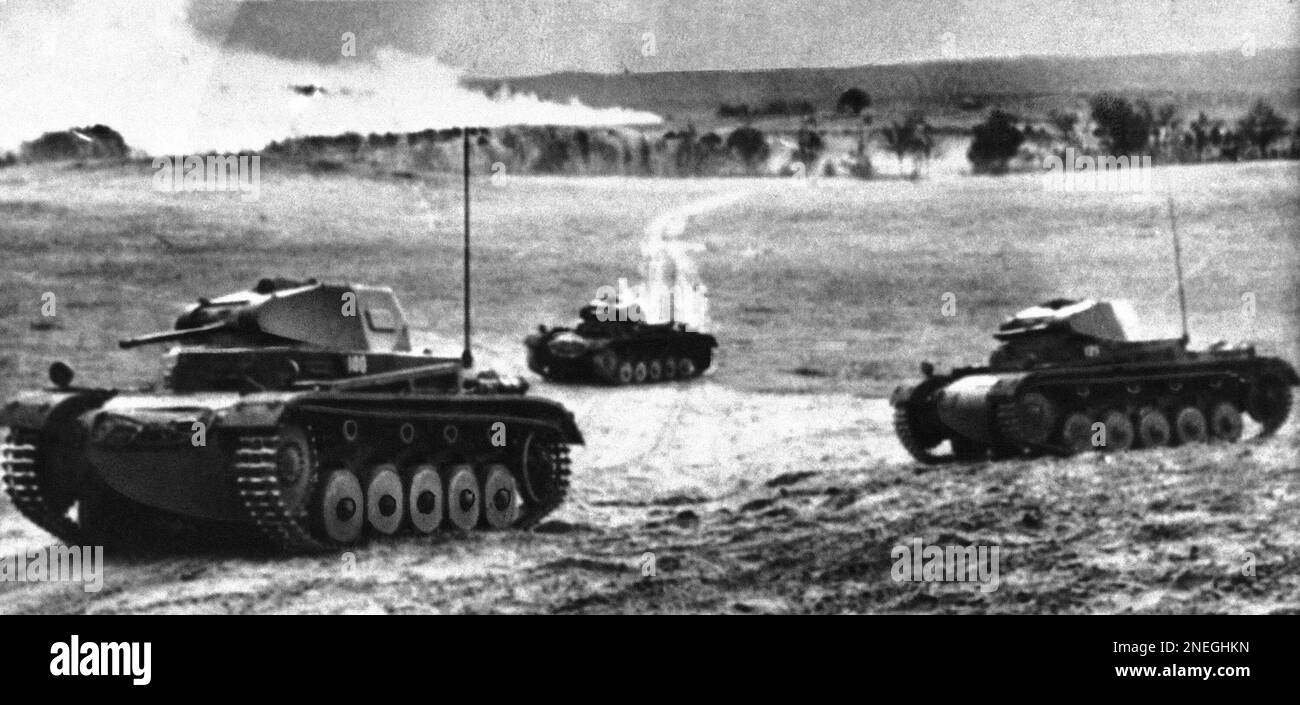 Two months after the accord of Munich, German Army units continued ...