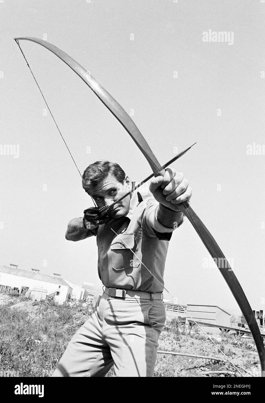 An expert archer, Rod Taylor gets in some practice, May 11, 1964 at his ...