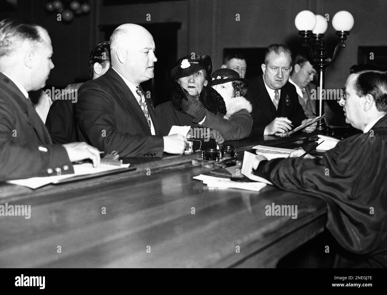 Maryon Cooper Hewitt in black with veil over face, is arraigned at ...
