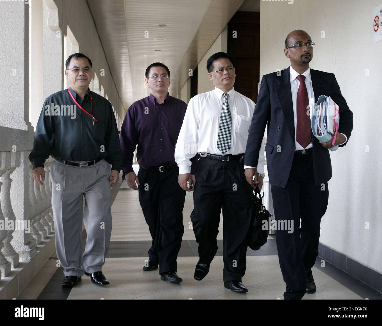 From left, President of the Borneo Evangelical Church Daniel Raut, Vice ...
