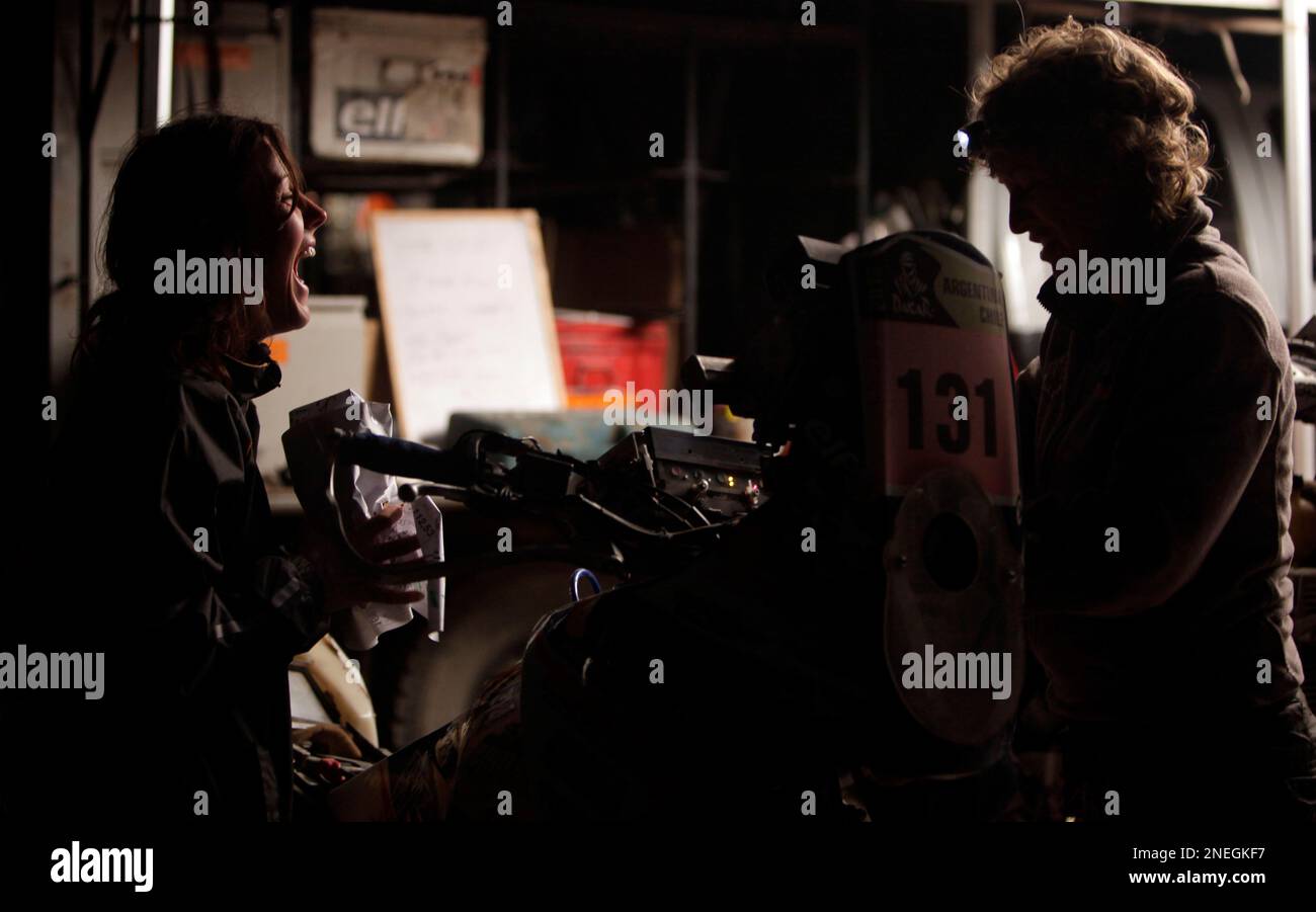 Great Britain's Yamaha's rider Tamsin Jones, left, laughs while working ...