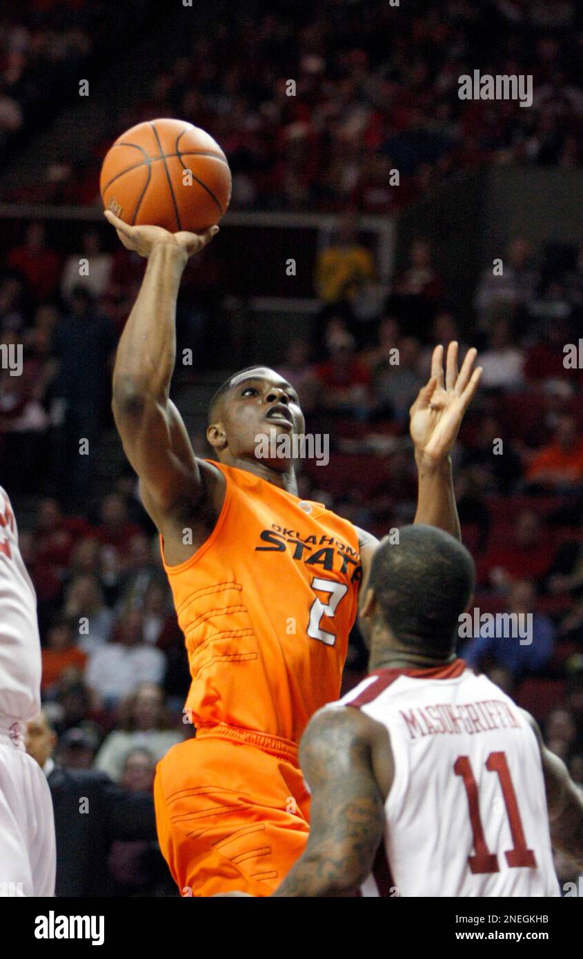 Oklahoma State guard obi Muonelo (2) goes up for a shot in front of ...